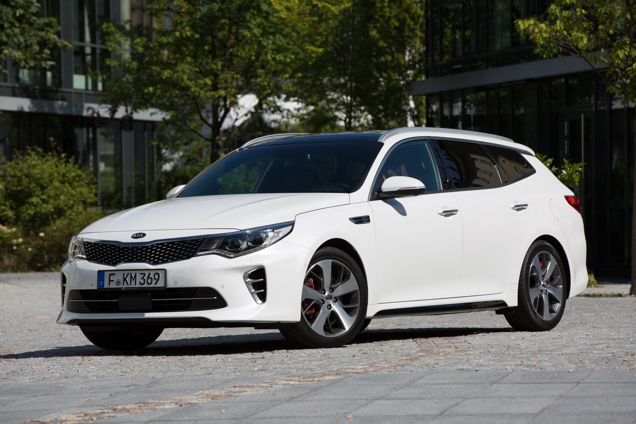 Photo 17 - Kia Optima SW blanche GT roulant vue avant gauche - Prix Kia ...