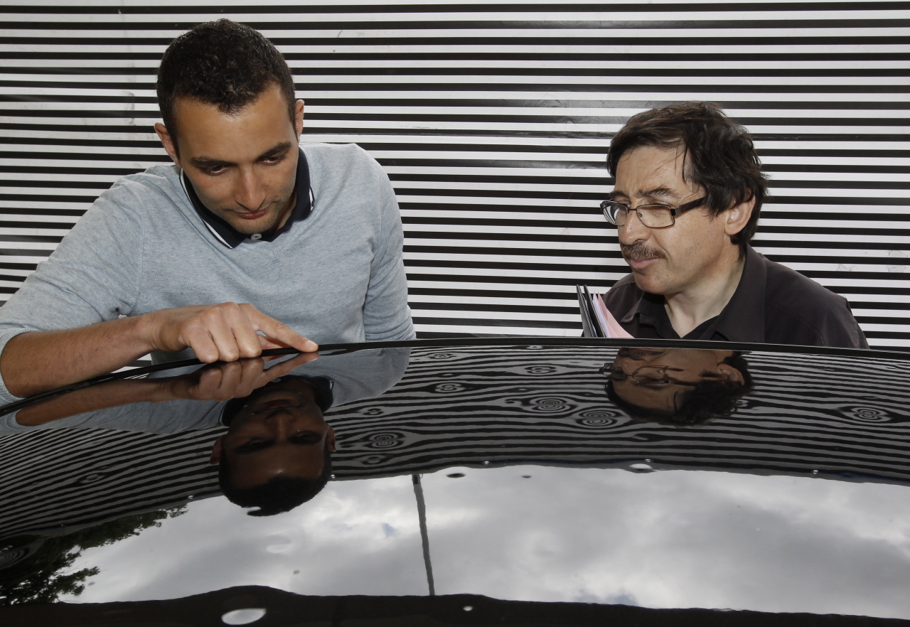 Diaporama et photos - Après la grêle, le débosselage | L'Argus