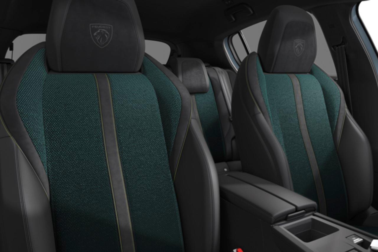 Photo 4 - La sellerie mêle Alcantara et tissu TEP. - Peugeot e-308 ...