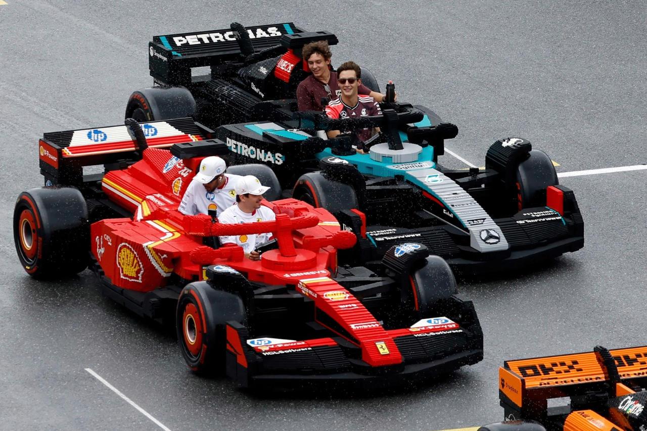 Photo 4 - Charles Leclerc, Lewis Hamilton, George Russell et Kimi ...